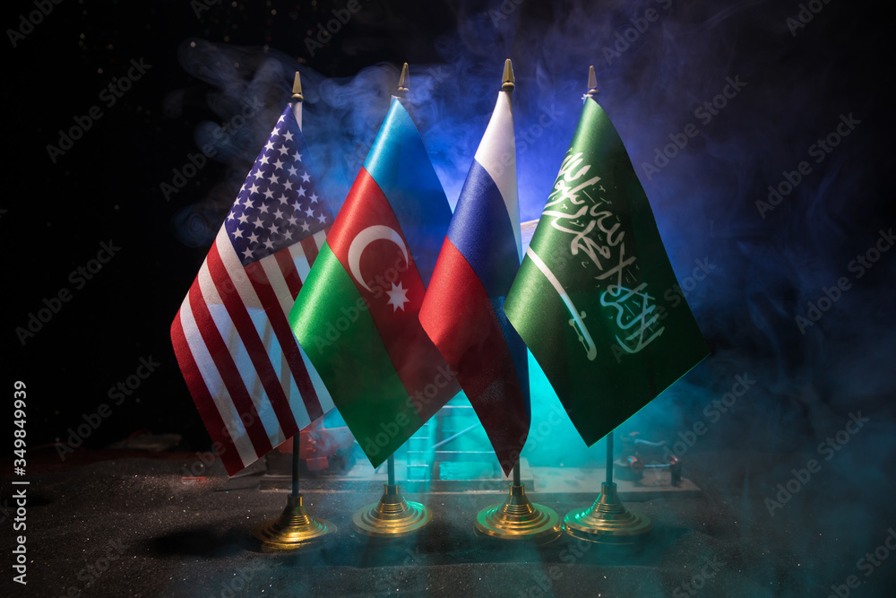 Business dialogue, oil agreement concept: National flags with Oil pump ...