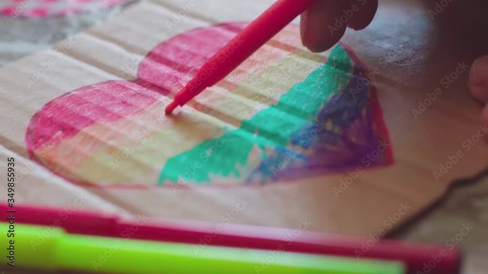 Pride day 2020. Female drawing rainbow flag on carton. Preparation ...