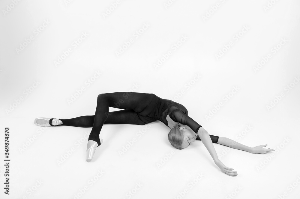 Black and white picture of gymnastics female acrobat in the back bend ...