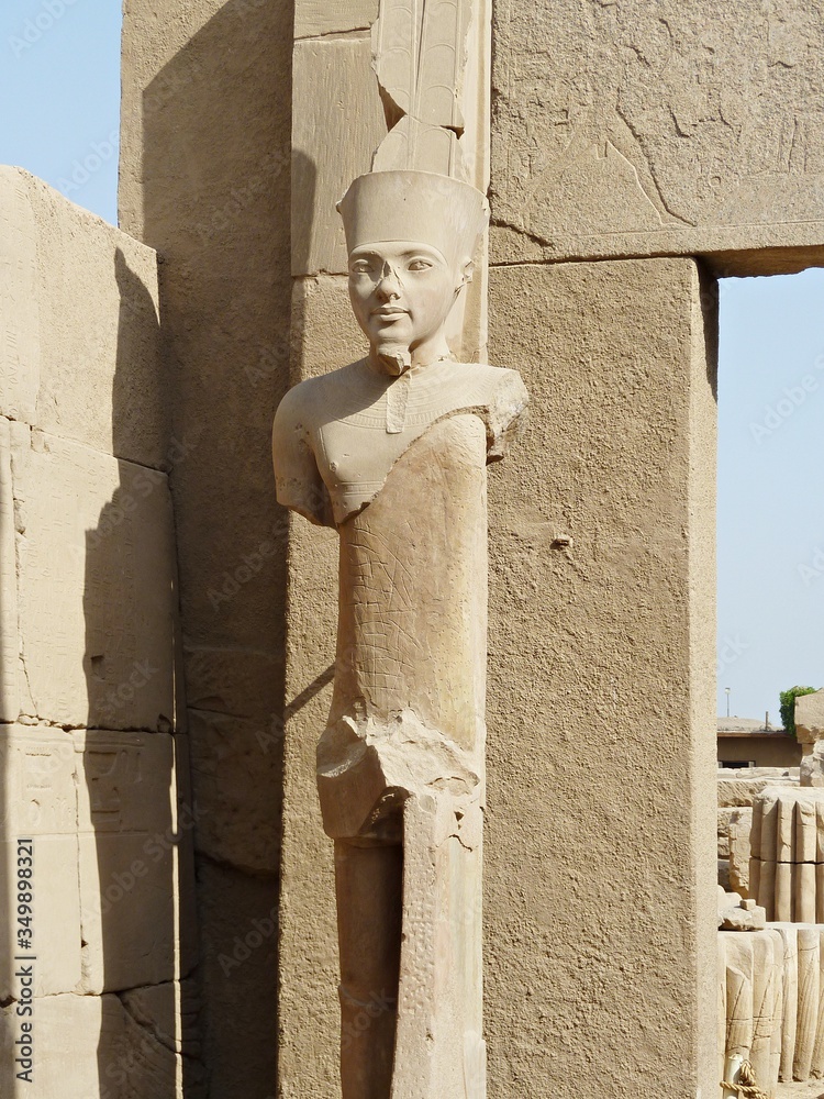 Statue of Tutankhamun in the form of Amun Ra, at Karnak temple in Luxor ...