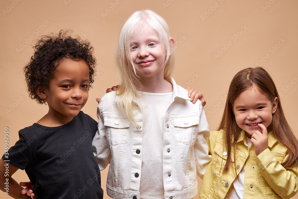 diverse smiling positive children posing at camera, happy dark-skinned ...