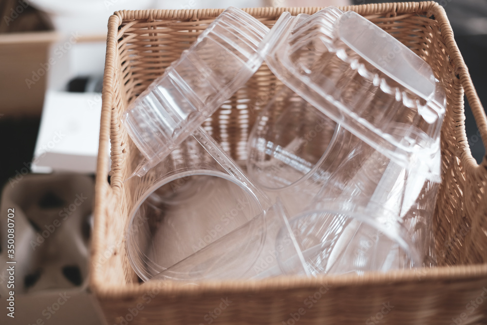 plastic food packaging in the basket for recycle and environmental ...