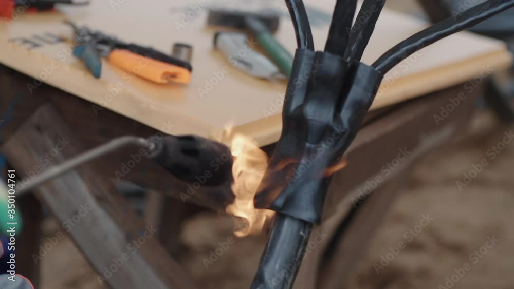 Close up for heat shrink tubing for the protection of cables isolation ...