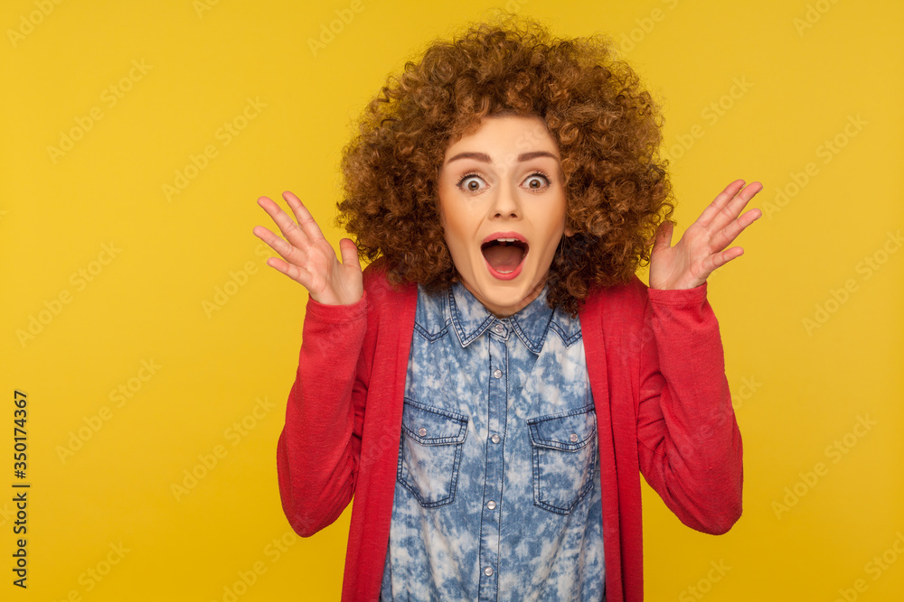 Wow, I'm impressed! Portrait of excited amazed woman with fluffy curly ...