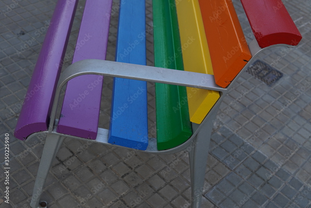 Banco pintado de colores arco iris Stock Photo | Adobe Stock