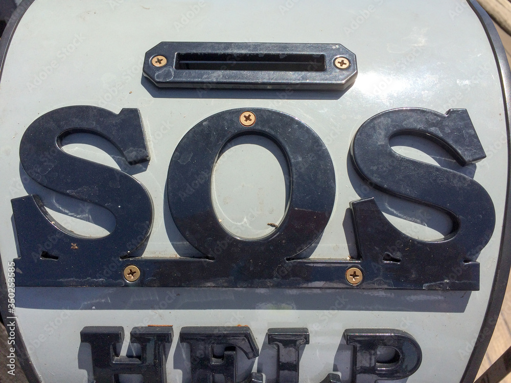 SOS save our ship sign money donation collection box on USS Iowa naval ...
