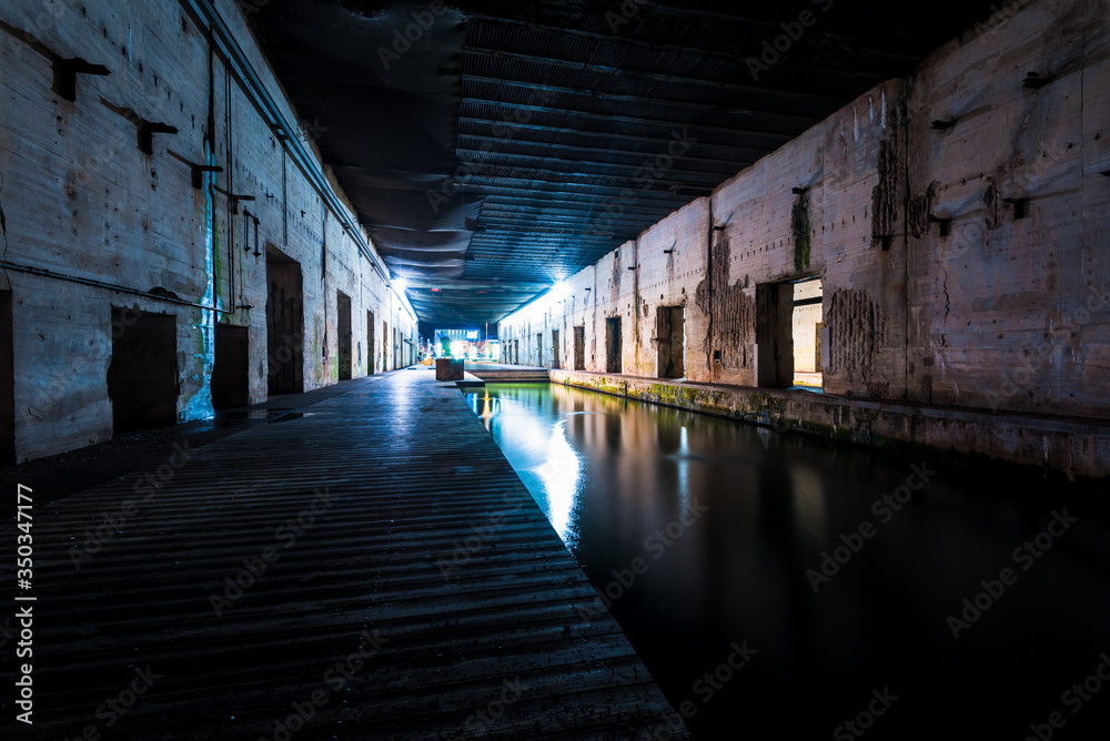 Illuminated submarine base of Saint-Nazaire at night, France. Travel ...