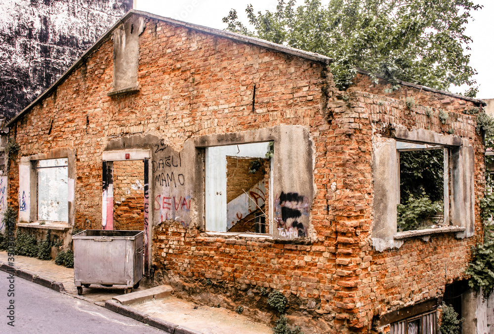 abandoned tumbledown house, windows and door removed uninhabitable ...