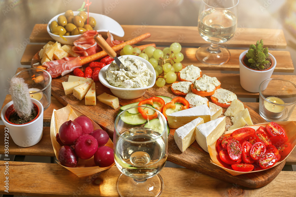 Italian drink aperitif.Traditional Italian snacks (antipasto): salami ...