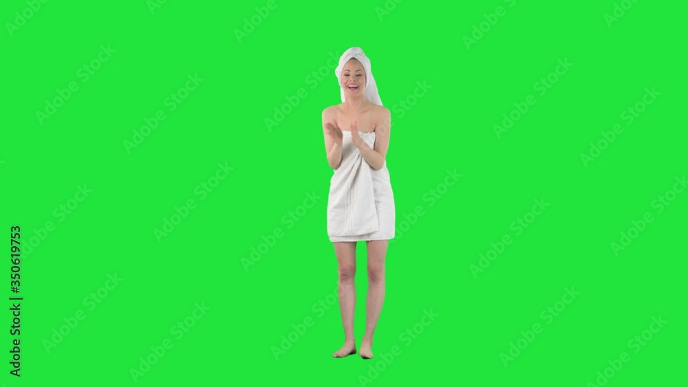 Excited young woman cheering and celebrating applauding and clapping ...