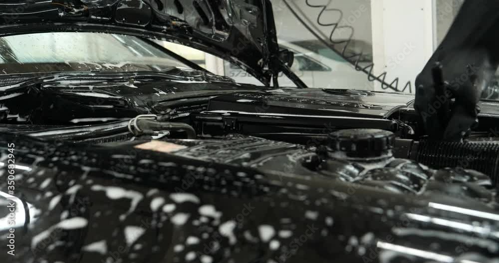 Washing car engine. Car wash service before and after washing. Cleaning ...