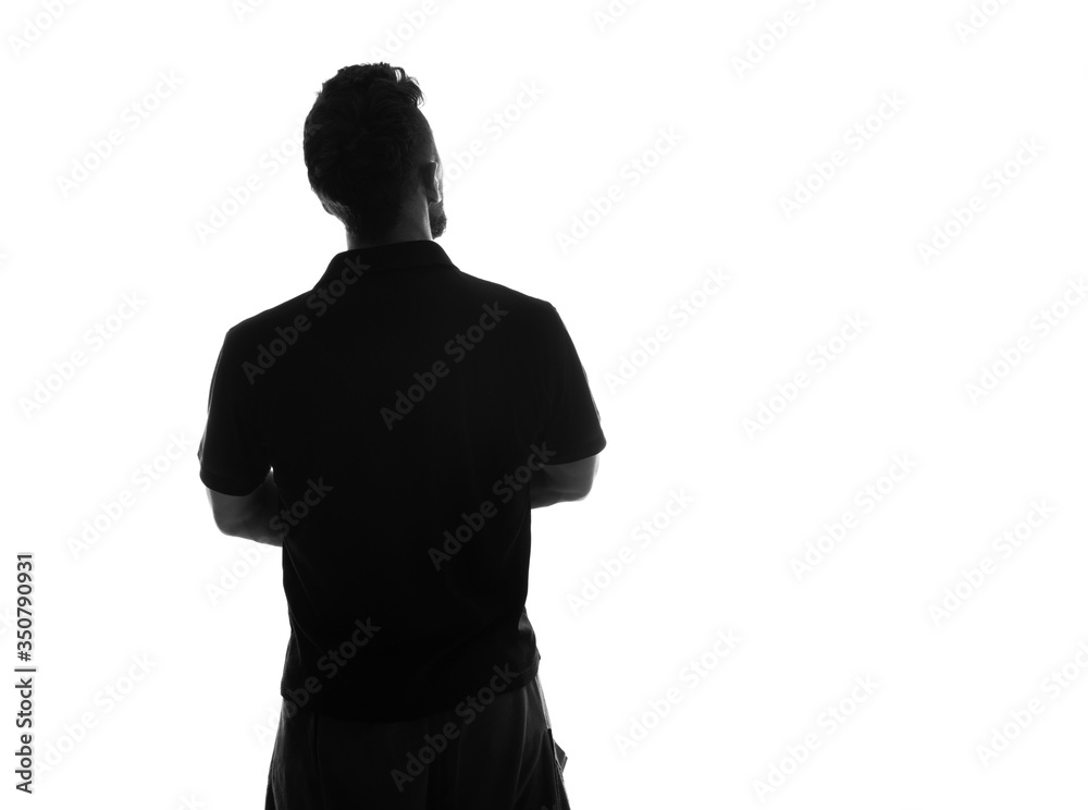 Back side silhouette of male person , back view back lit over white ...