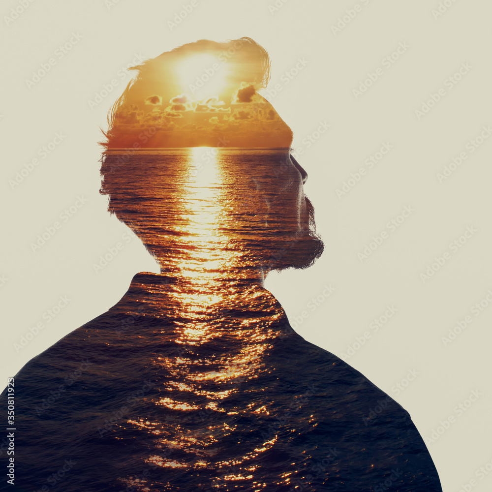 Double exposure portrait of a man in contemplation at sunset time Stock ...