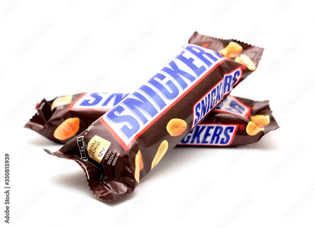 Snickers candy bar on white Stock Photo | Adobe Stock