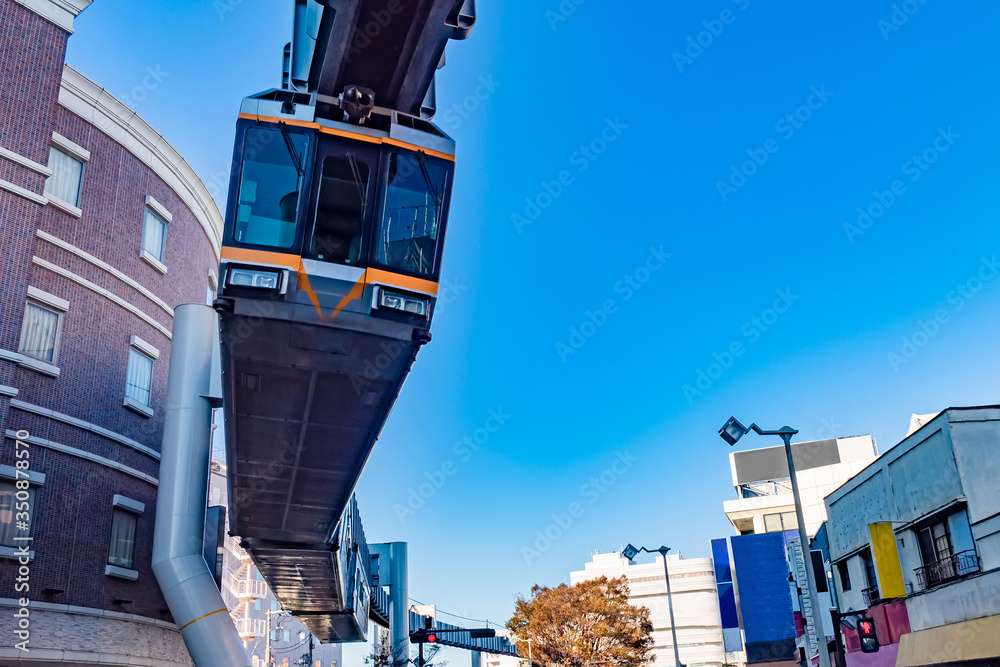 Japan. Suspension railway in Fujisawa. The train is moving on a ...