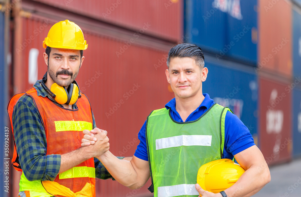 Engineer and worker soul brother handshake, thumb clasp handshake or ...
