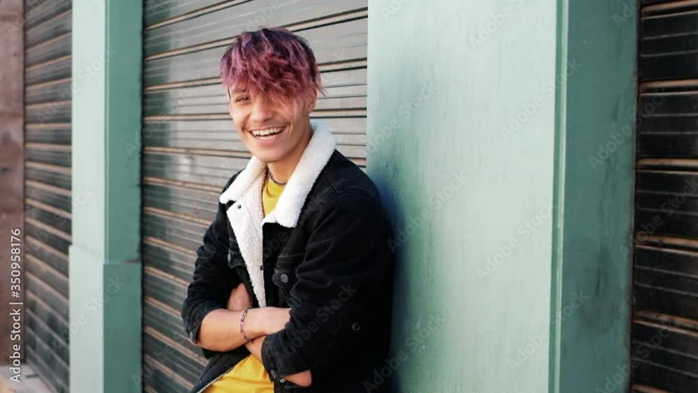 Urban style generation z young teenager portrait with city wall in ...