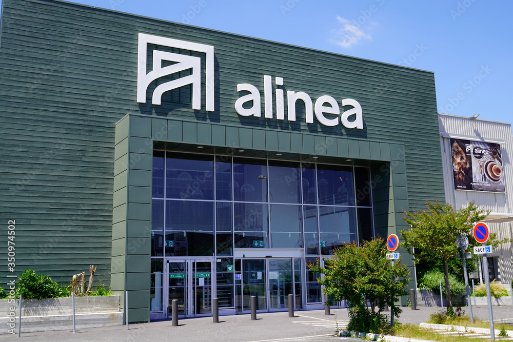 Alinea sign store logo on facade french house shop interior home ...