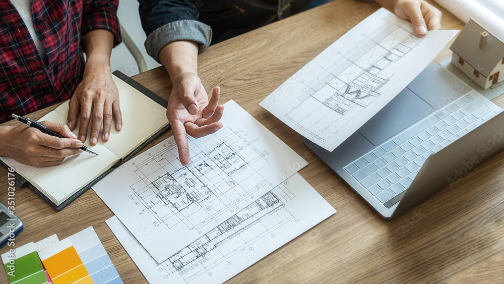 Interior designer and Architect choosing color in color swatch samples ...