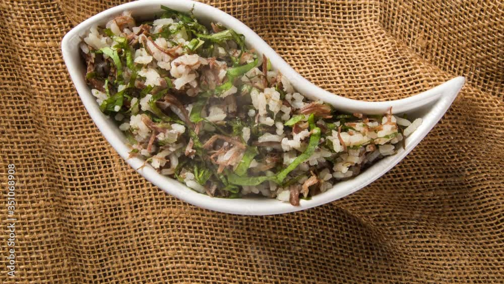 Brazilian traditional food called arroz de carreteiro with smoke. Top ...