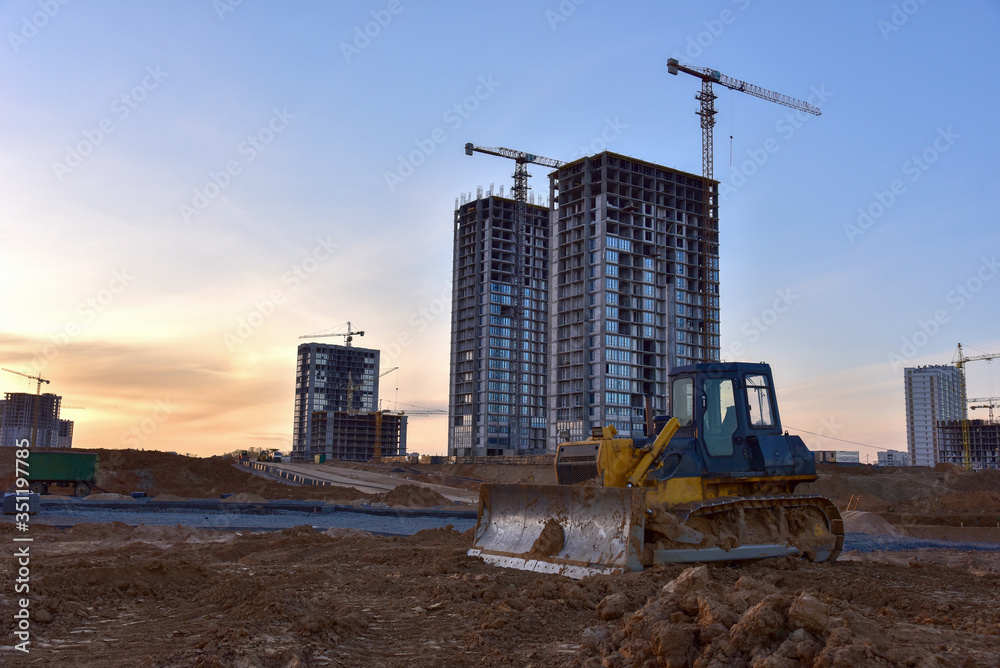 Dozer at open pit mining on sunseet background. Bulldozer for land ...