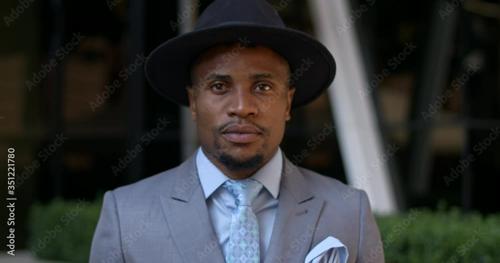 Adult good looking guy in stylish classical tailored suit and tie ...