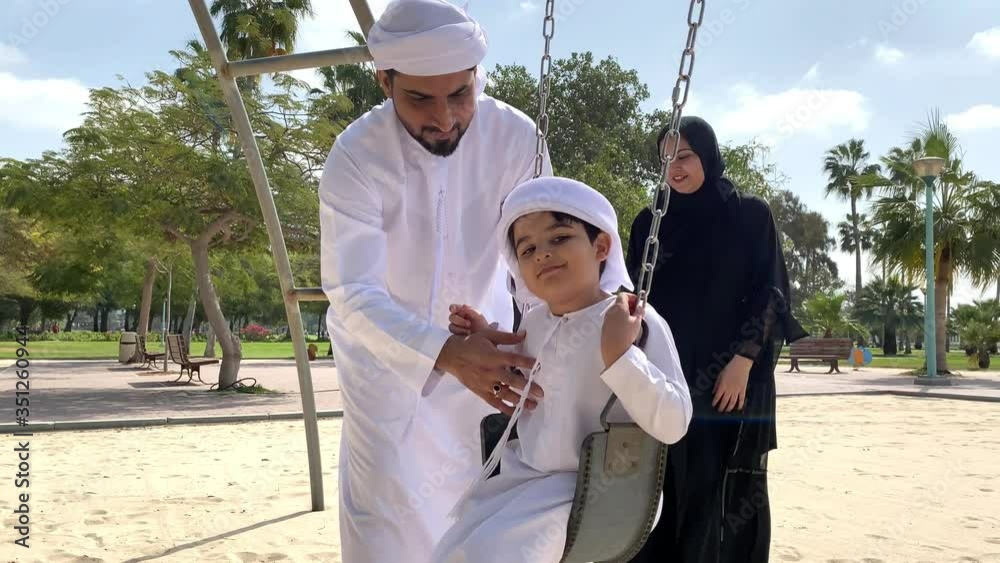 Emirati Family spending during the day. Arab Father with his Middle ...