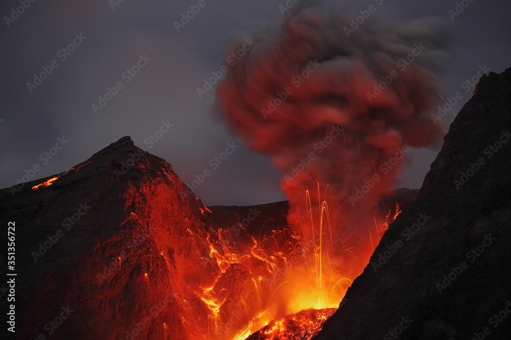 Indonesia, View of lava erupting from Batu Tara volcano island Stock ...