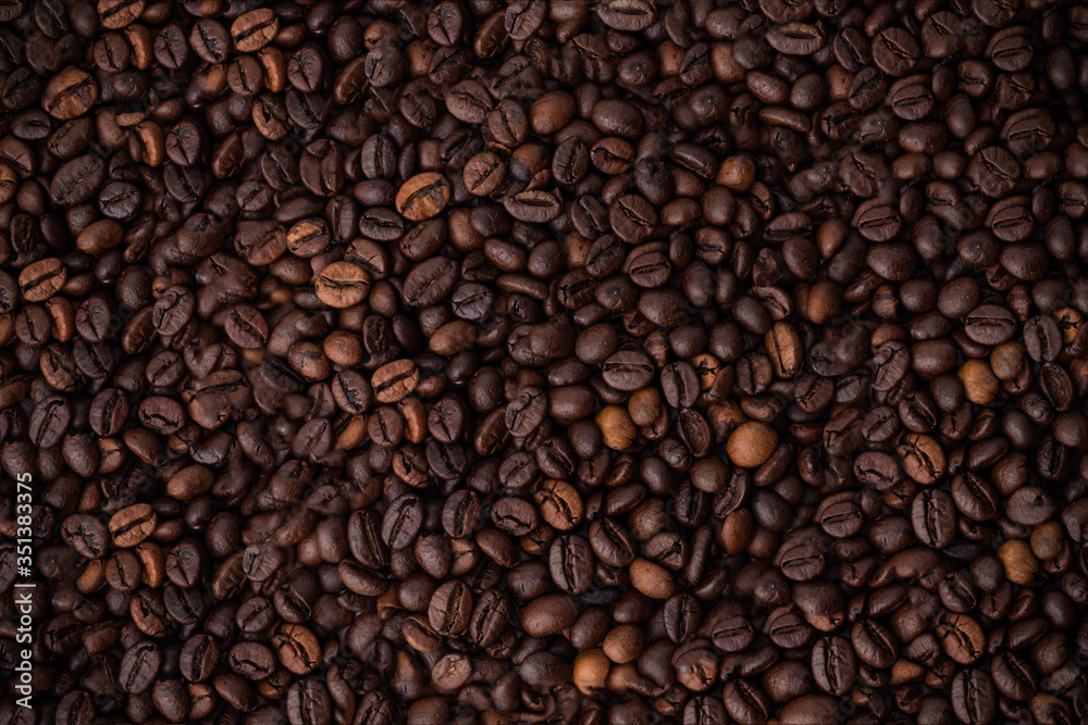 beautiful coffee beans texture. uniform background of roasted coffee ...