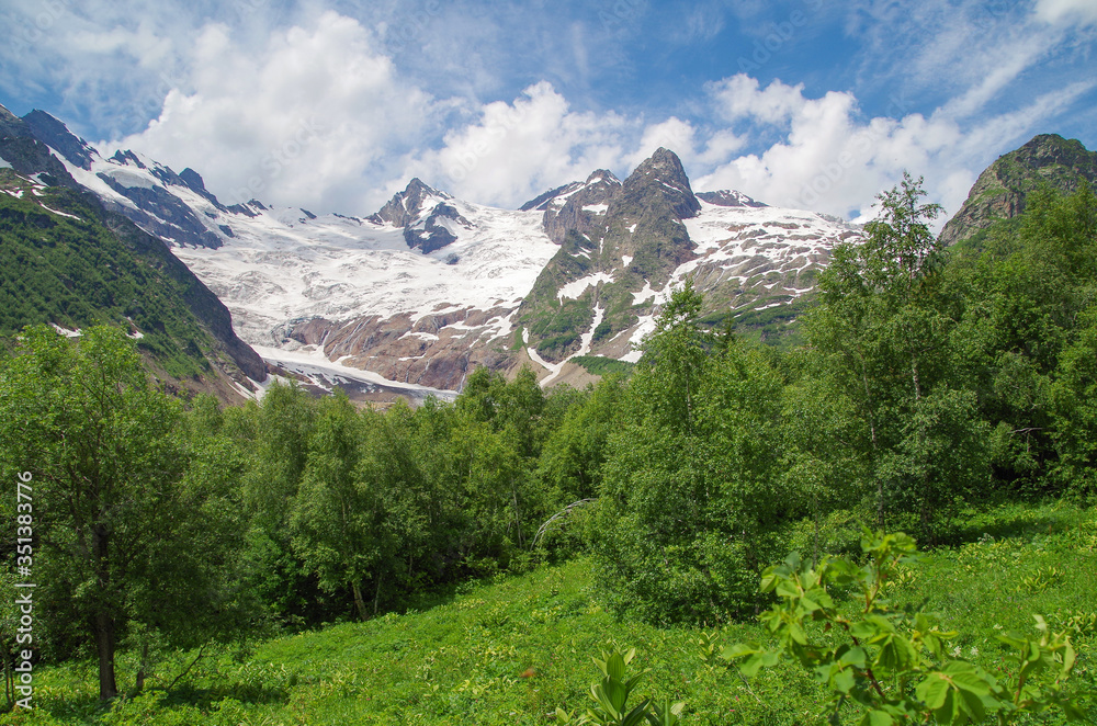 Dombay. Trek to Alibek Fall. Scenic view of Herzog (3863 m) and Alibek ...