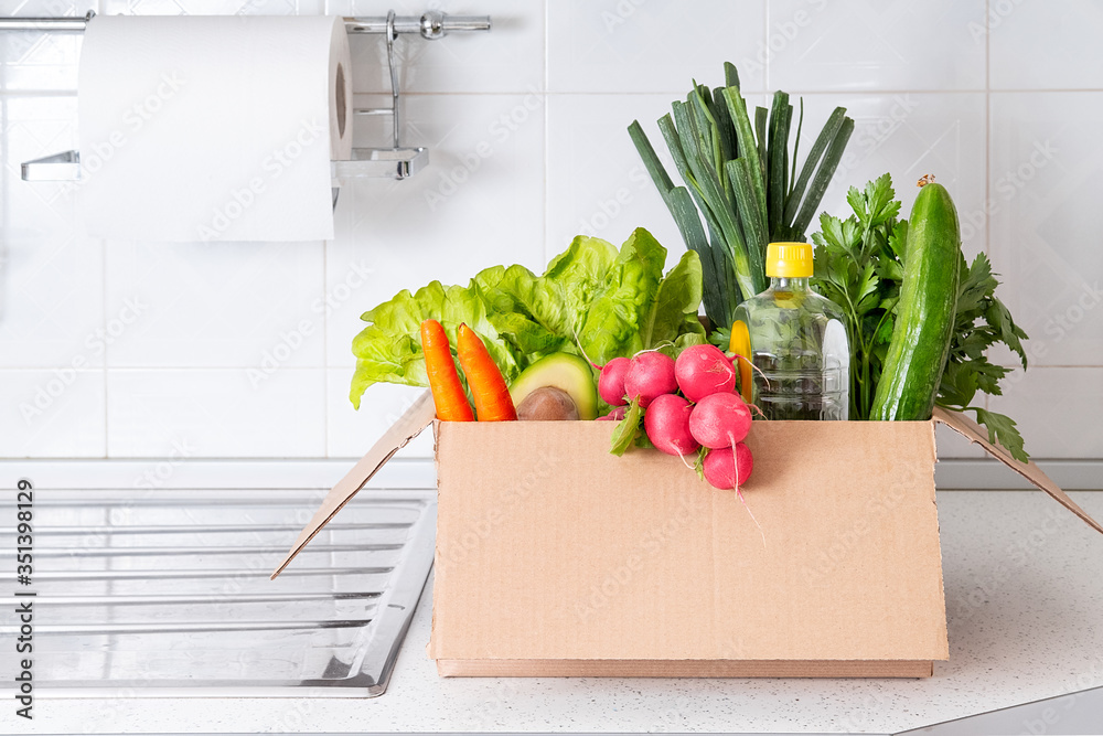 Donation box with superfoods fruits and vegetables. Sharing food ...