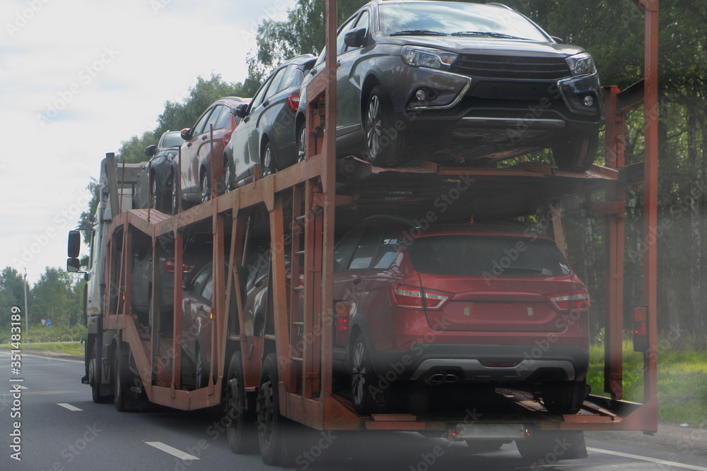 Loaded two level car carrier truck with two-axle car transporter semi ...