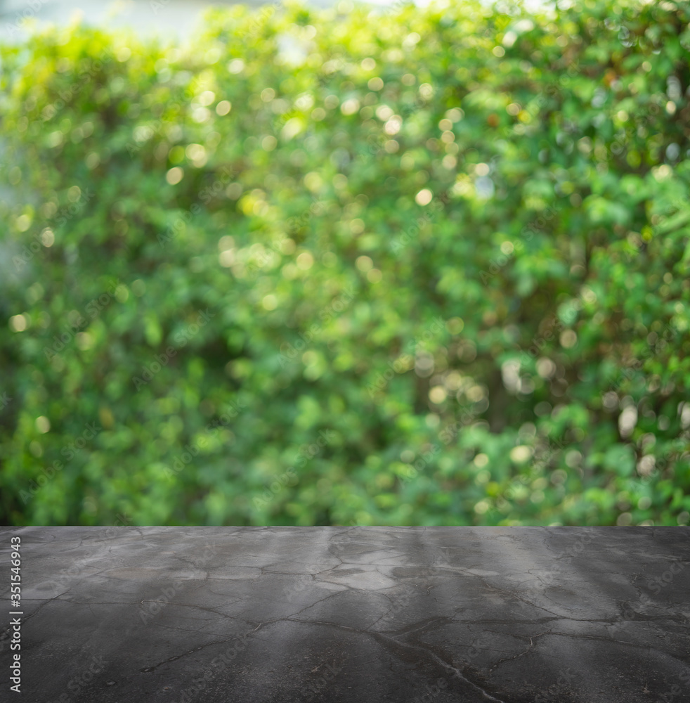 Texture of concrete terrace over blur nature view of green leaf on ...