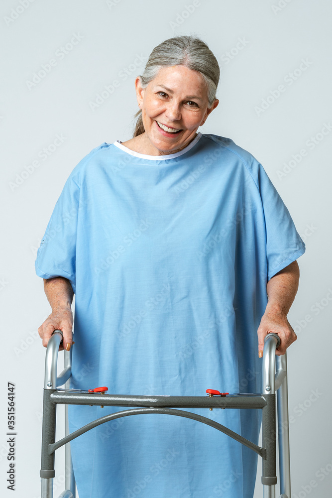 Happy patient using a zimmer frame Stock Photo | Adobe Stock