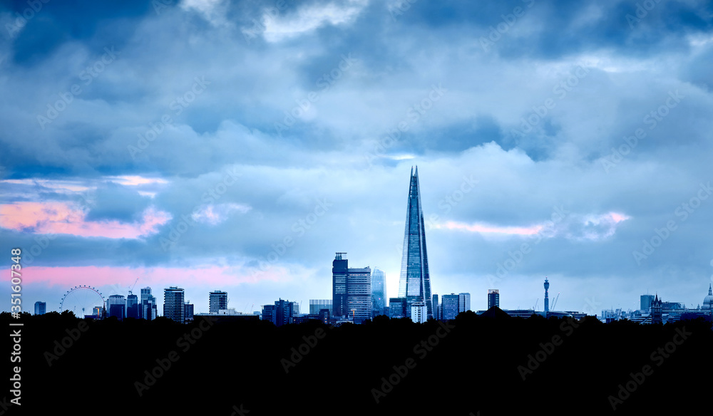City skyline at dawn. This photo of London has the first glow of the ...