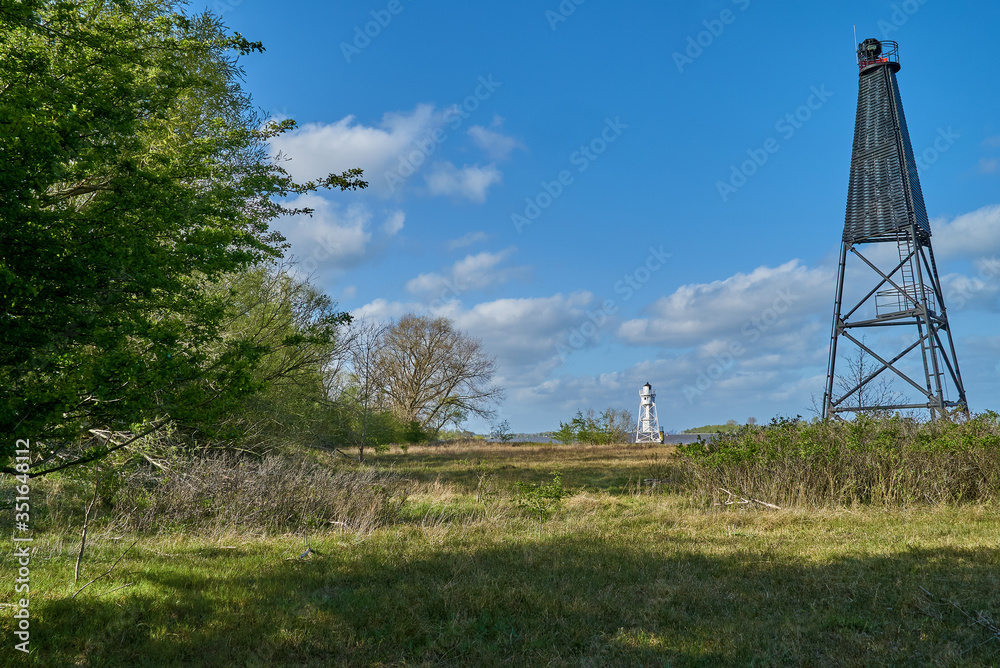 wooden black lighthouse on the island Elsflether Sand in the river ...