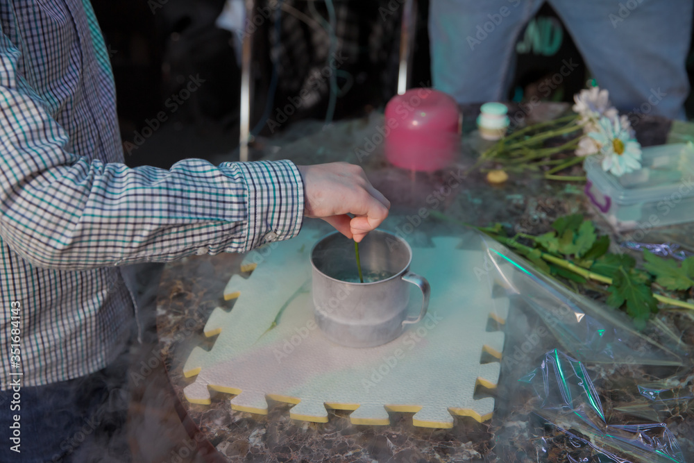 Chemical experiment, show with liquid nitrogen . researcher in uniform ...