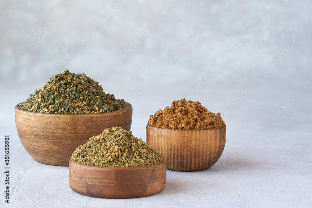 Mixed spice zaatar or zatar in wooden bowls, Various type of zaatar ...