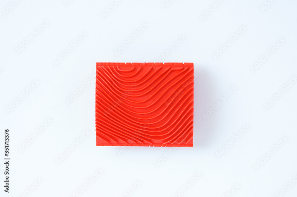 Red square rubber decorative stamp for simulating a wood texture on ...