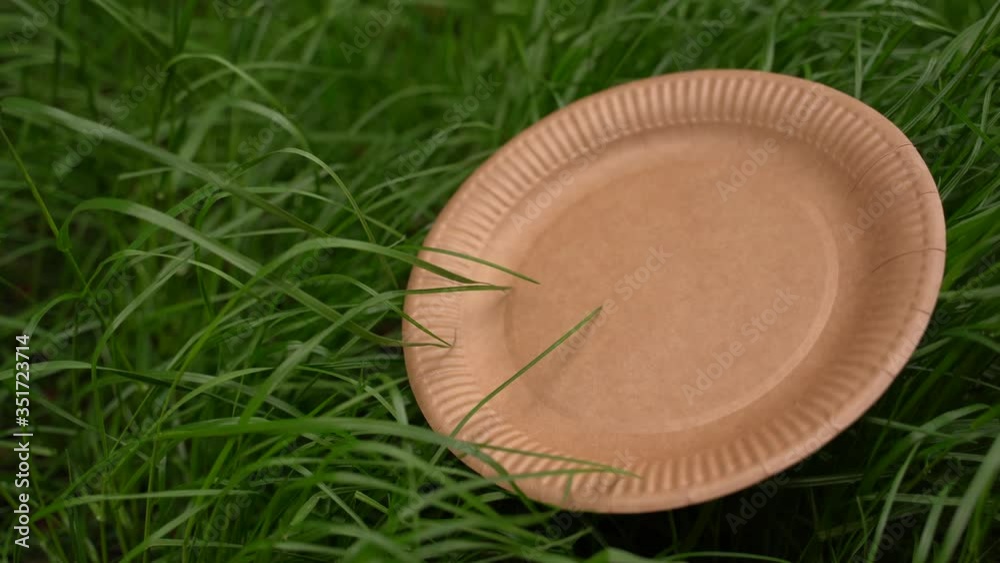 Video Stock 4k Eco-friendly natural plate from a set of disposable ...