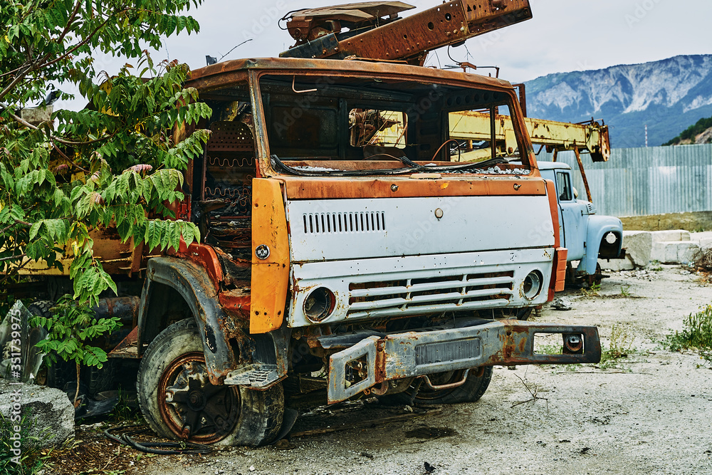 Old abandoned rusty wrecked Kamaz car. Kamaz in a landfill. Photos ...