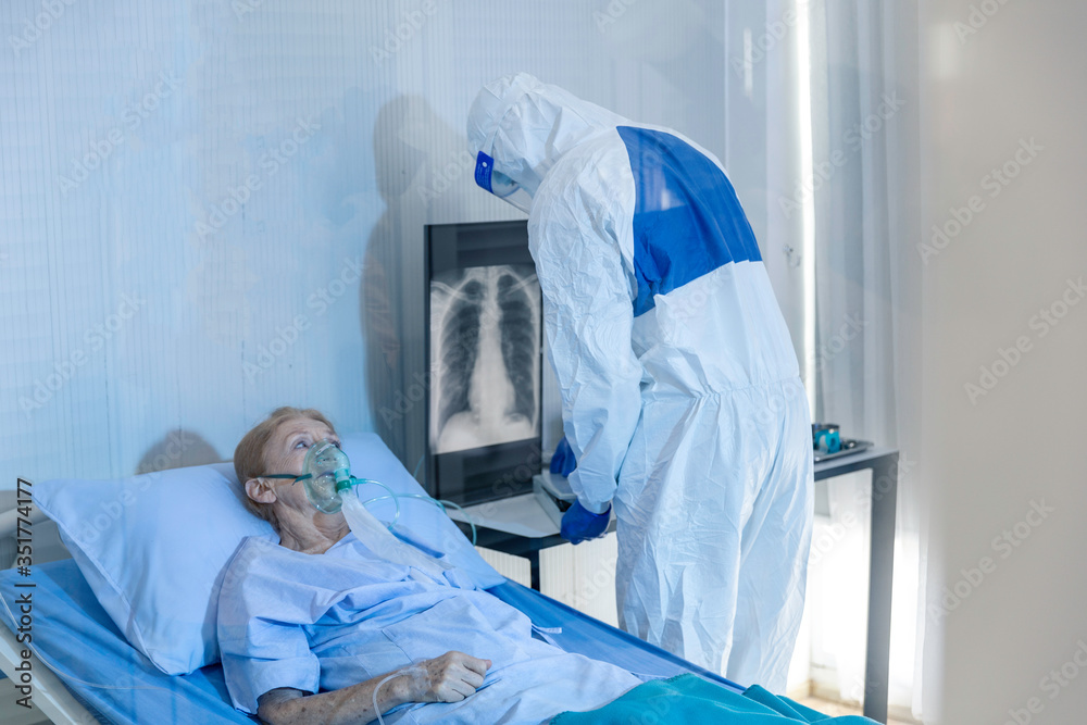 Female virus infected patient gets support from doctor with oxygen mask ...