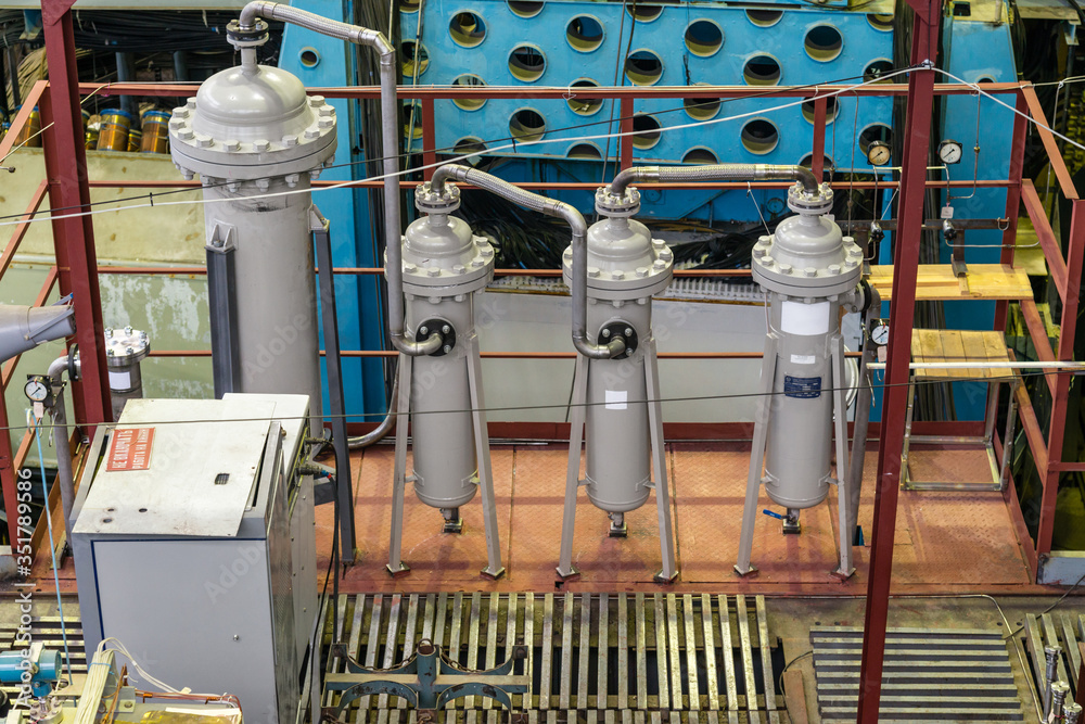 Science physics laboratory. Industrial, metal pipes, cables and digital ...