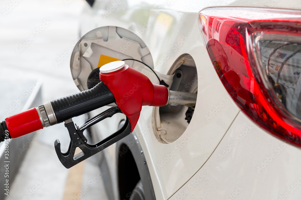 Refill and filling Oil Gas Fuel at station.Gas station - refueling.To ...