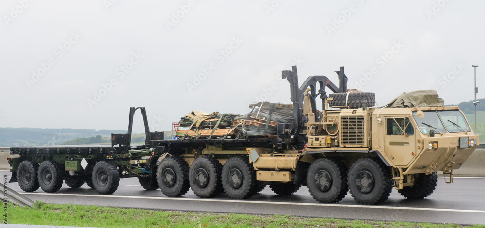 oshkosh PLS army truck on an austrian highway Stock Photo | Adobe Stock