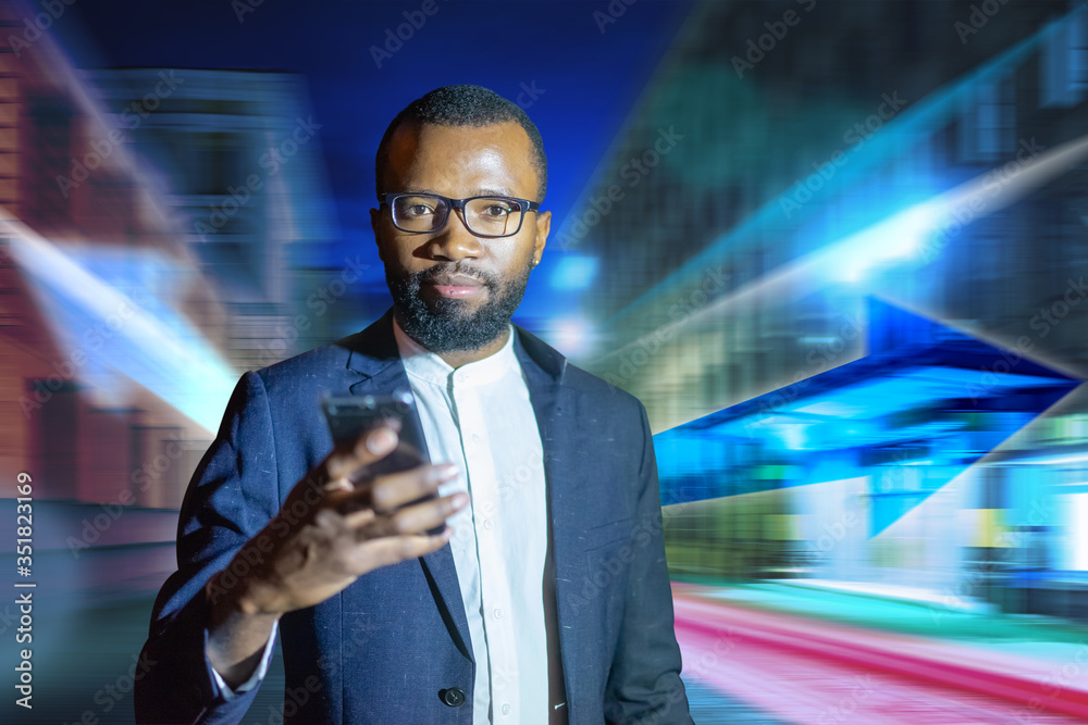 The concept of constant movement. A dark-skinned man with a phone on a ...