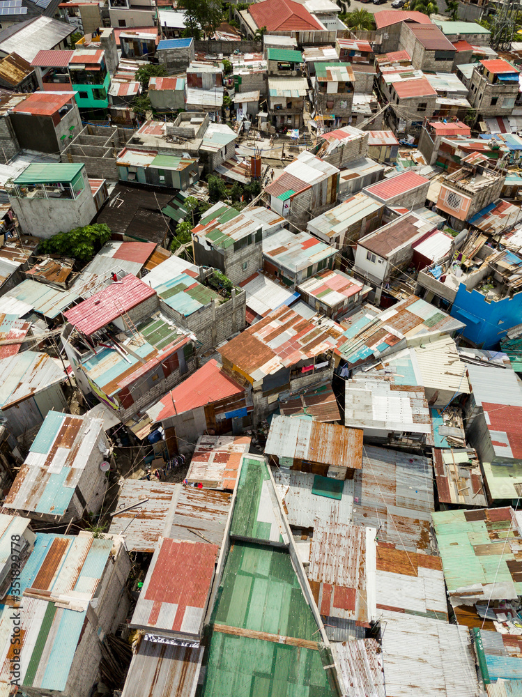 Sheet Metal and hollow block shanty houses in a poor slum area in ...