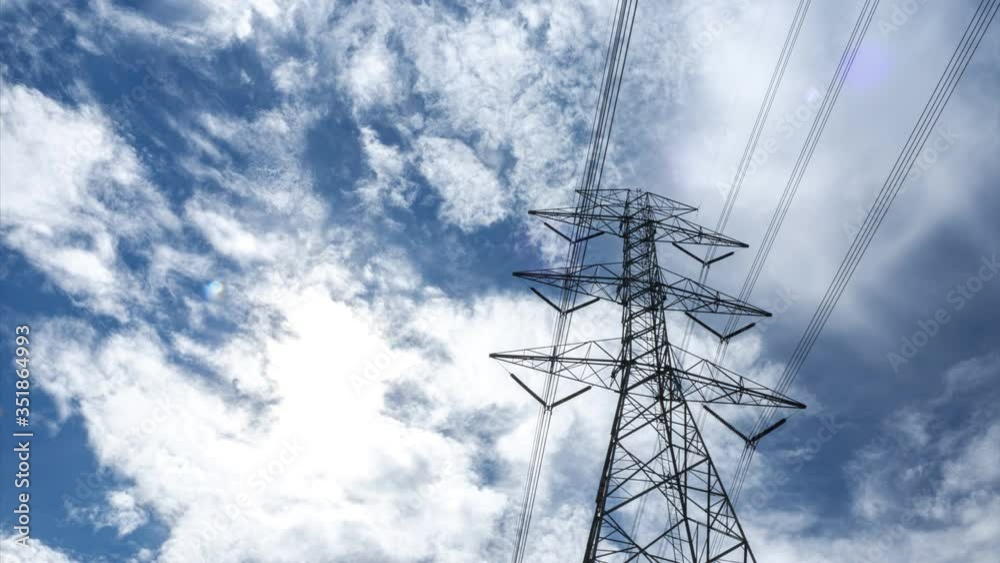 energetic power line time-lapse. 4k High voltage post moving cloud.High ...
