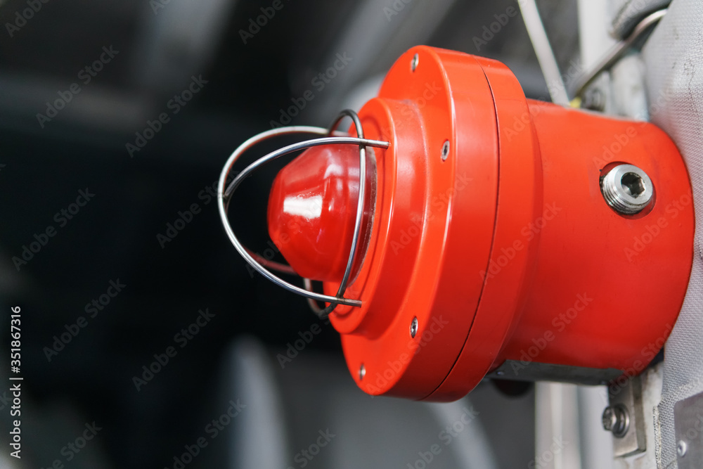 Red warning light of an emergency beacon at an industrial facility ...