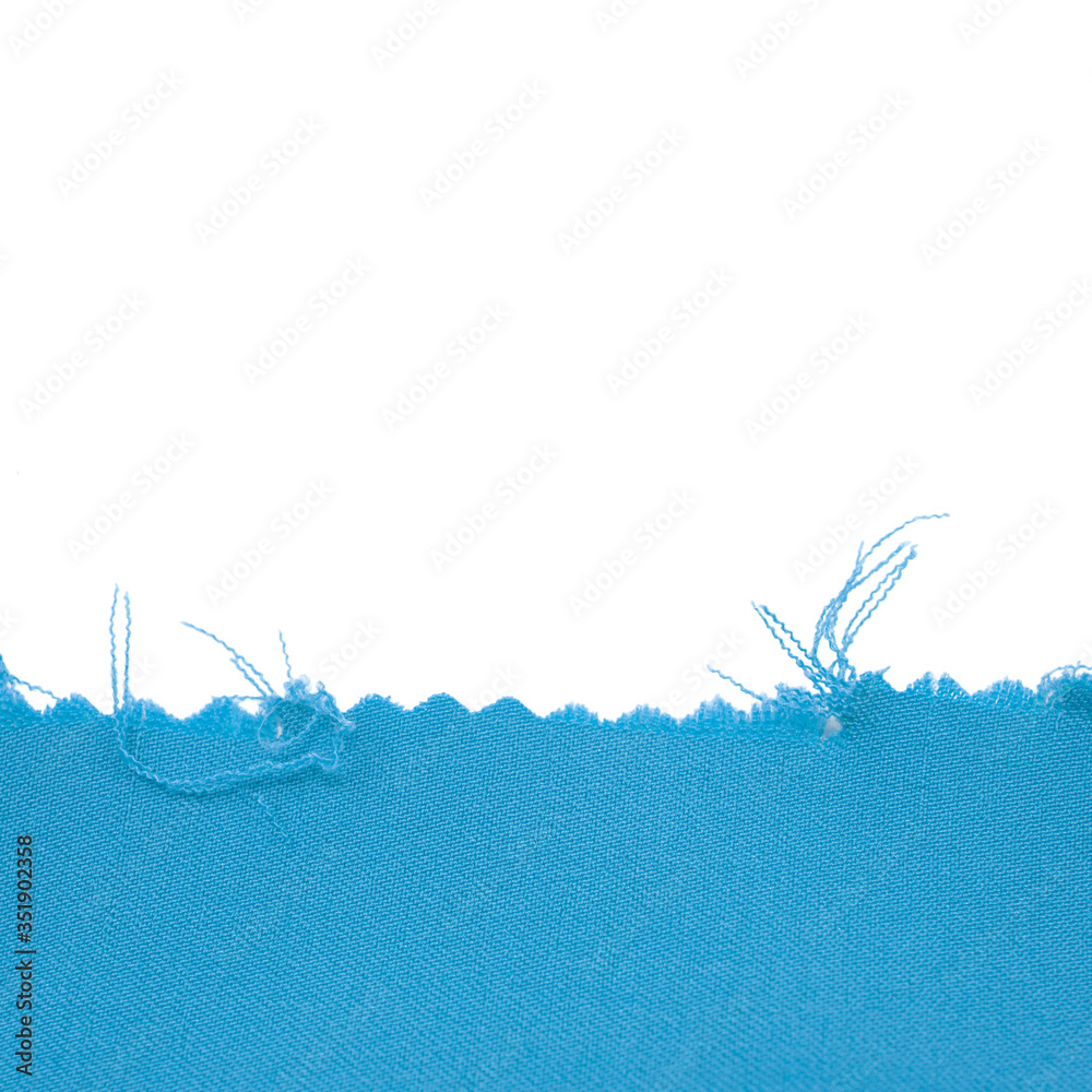 Blue fabric texture, sewing material, torn cloth. Rag background with ...